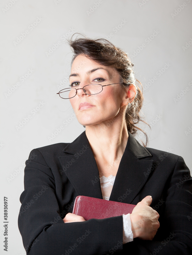 Stern Sunday school teacher with her bible Stock Photo | Adobe Stock