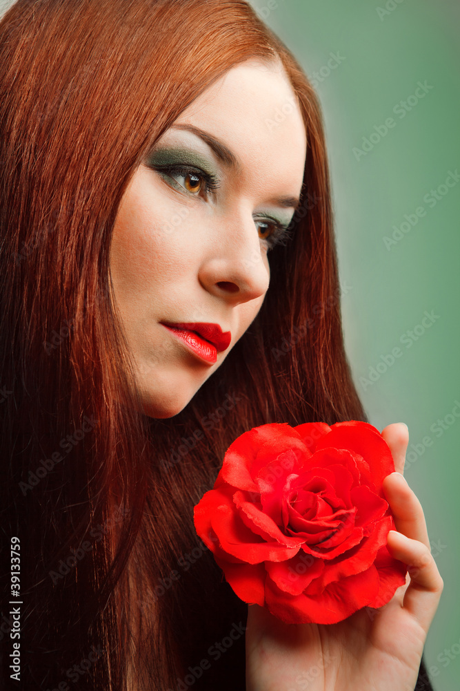 beautiful woman with red rose Stock Photo | Adobe Stock