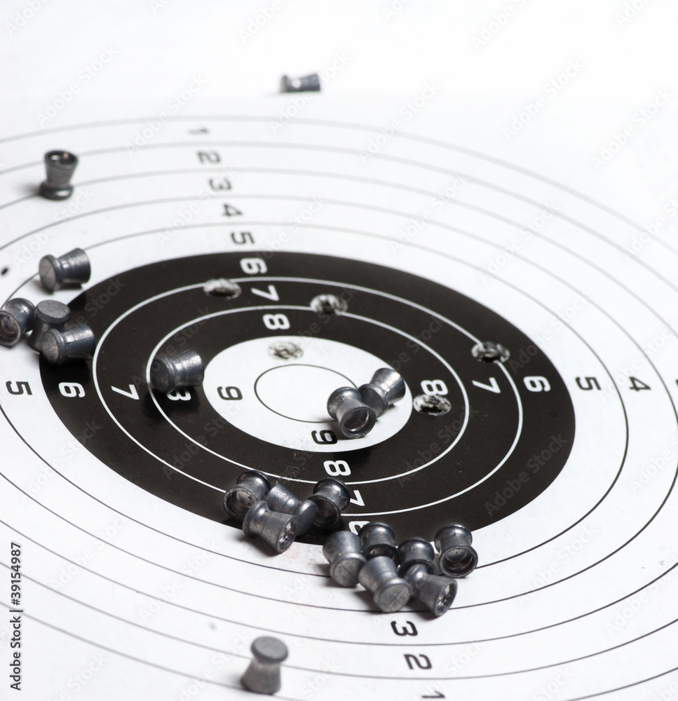 paper rifle target with bullet holes Stock Photo | Adobe Stock