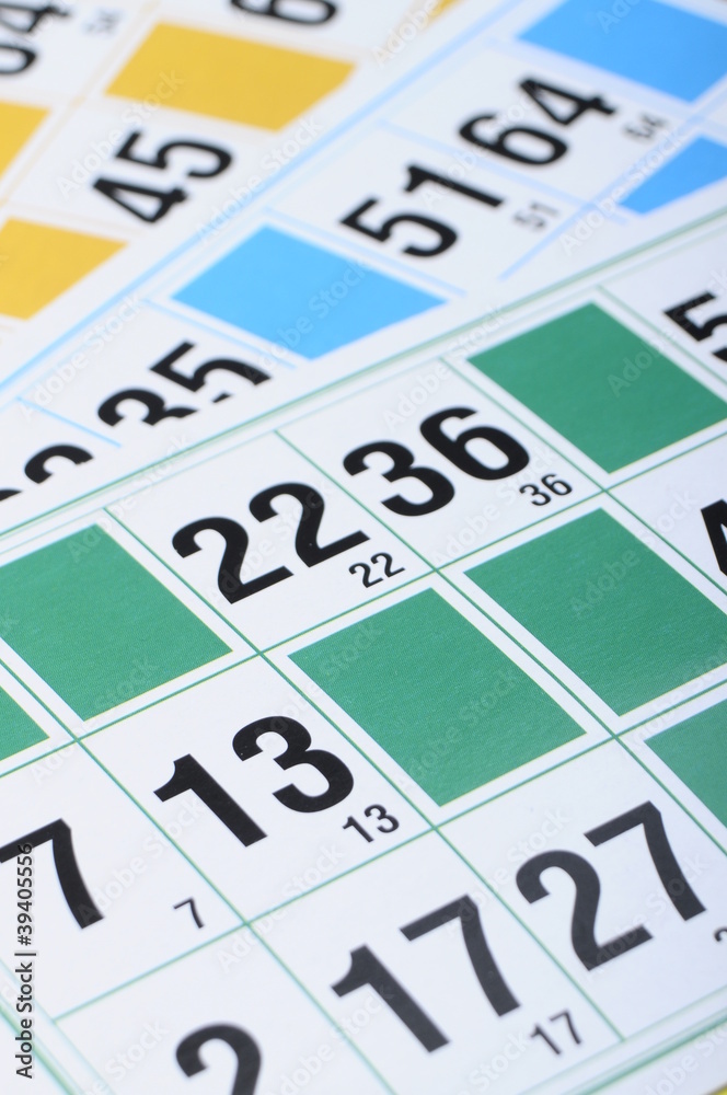 Green, blue, yellow bingo cards with focus on number thirteen Stock ...