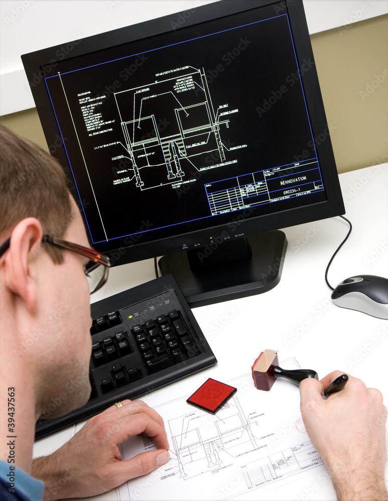 Engineer signing drawings Stock Photo | Adobe Stock