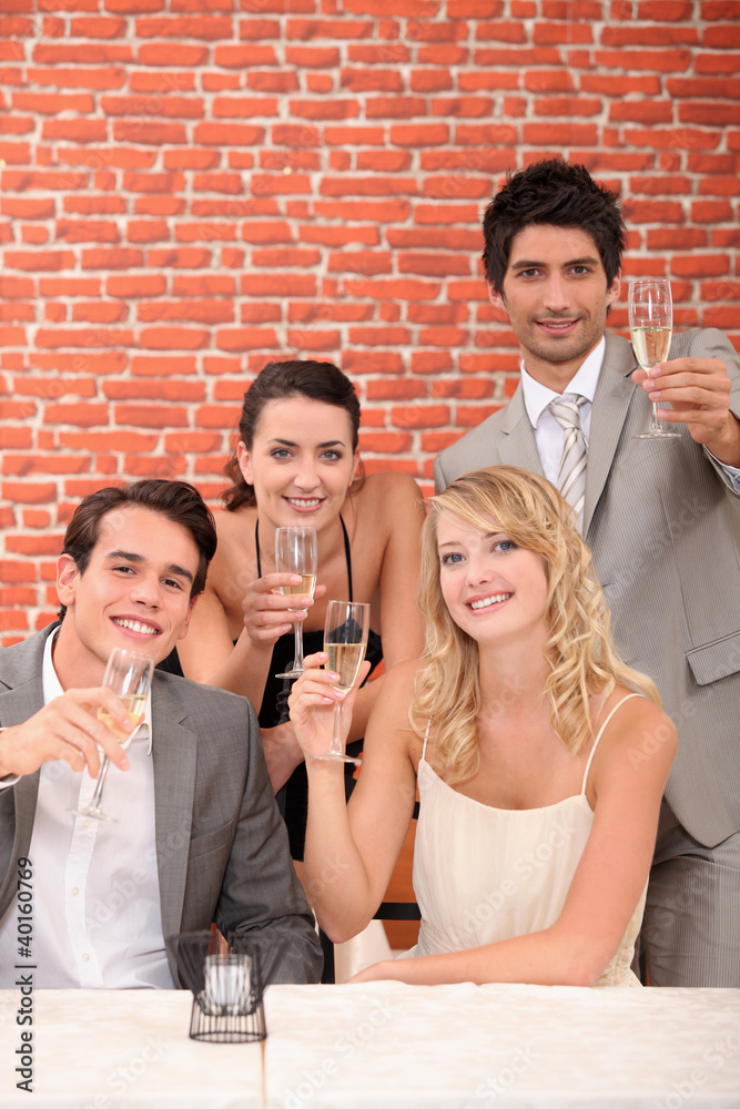 Co-workers celebrating Stock Photo | Adobe Stock