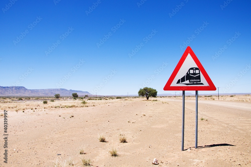 Warning of road sign - trains crossing the road, Namibia Stock Photo ...