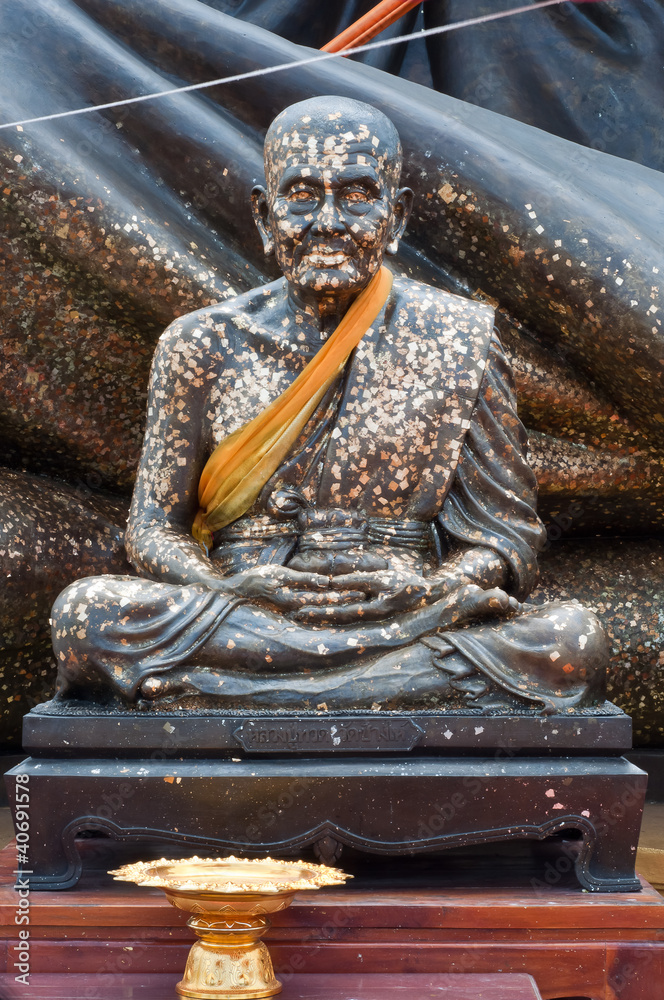 Buddhist monk statue Stock Photo | Adobe Stock