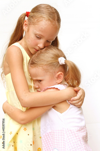 Two Sad Girls Hugging