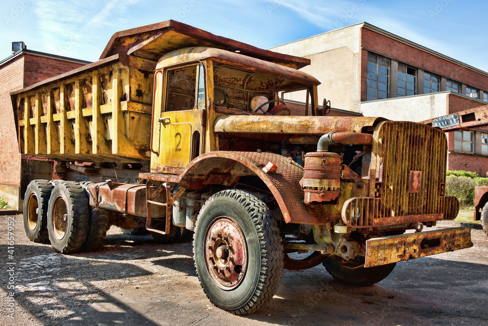 Old rusting yellow tipper truck Stock Photo | Adobe Stock