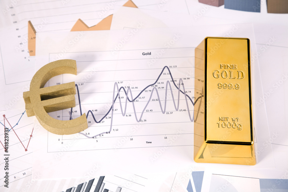 Gold bars on graphs and statistics, studio shots, closeup Stock Photo ...