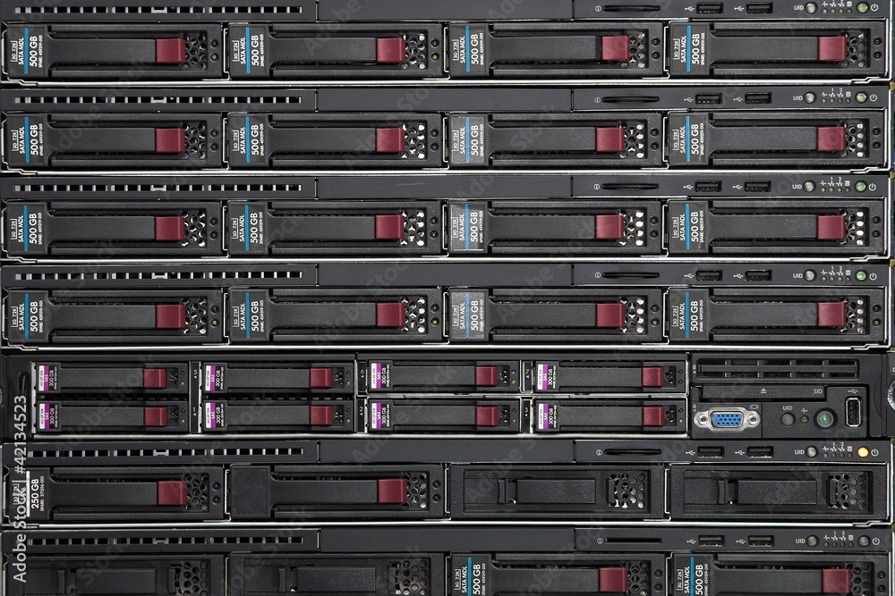 in front of server rack Stock Photo | Adobe Stock