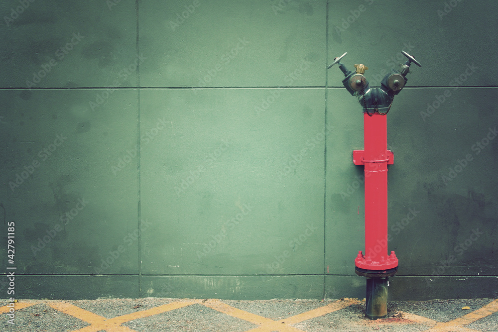 Vintage hydrant with water hoses and fire extinguish equipment Stock ...