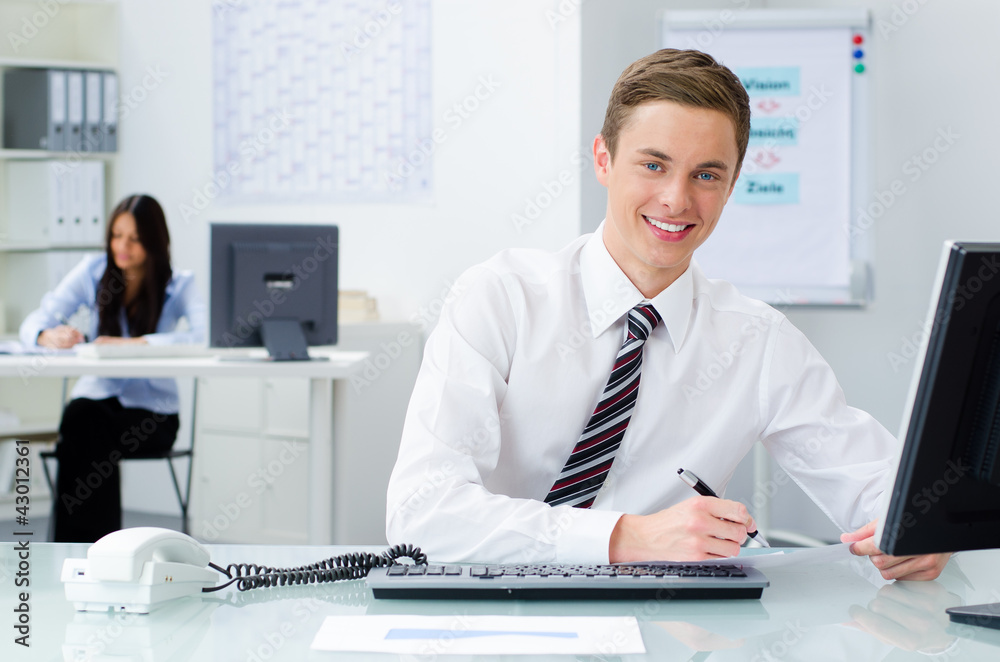 junger kaufmann in der ausbildung Stock Photo | Adobe Stock