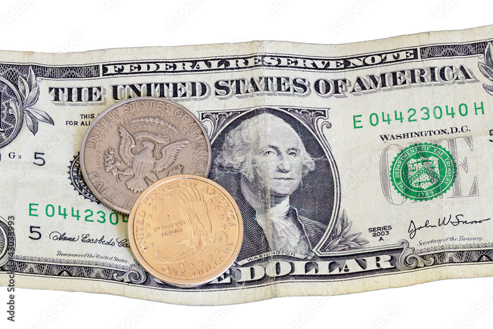 Dollar and half coin on top of single bank note Stock Photo | Adobe Stock