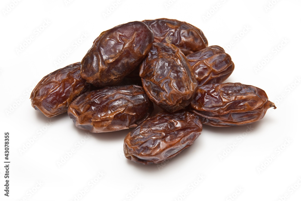 Medjool dates isolated on a white studio background. Stock Photo ...