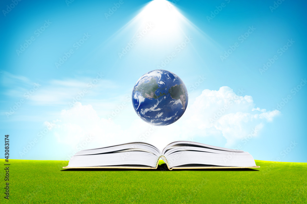 Book in the dark room with light and earth - education concept Stock ...