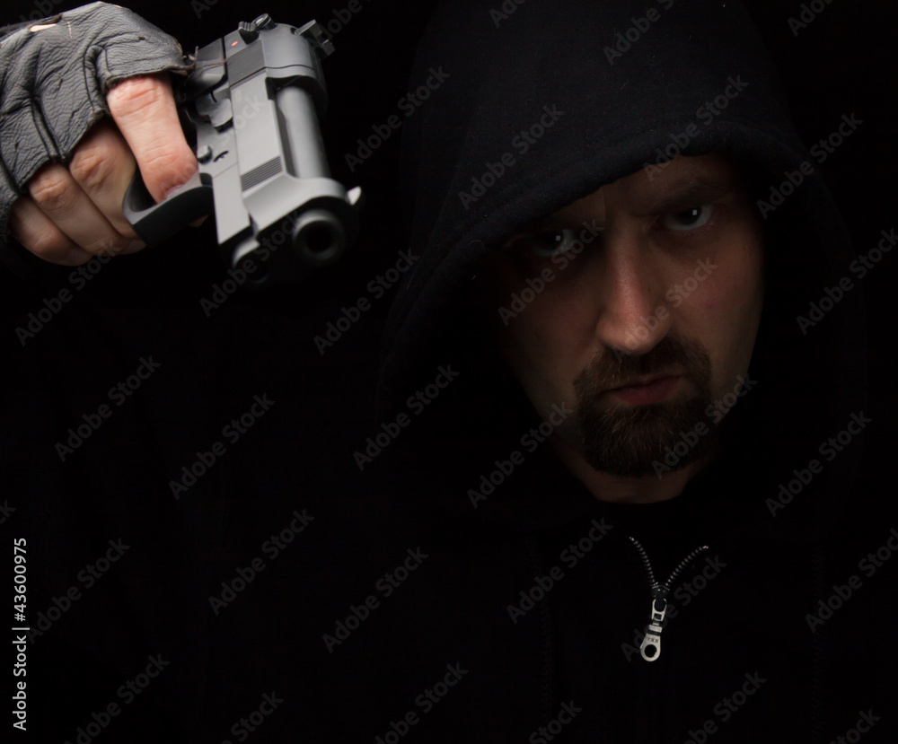 Gangster with gun Stock Photo | Adobe Stock