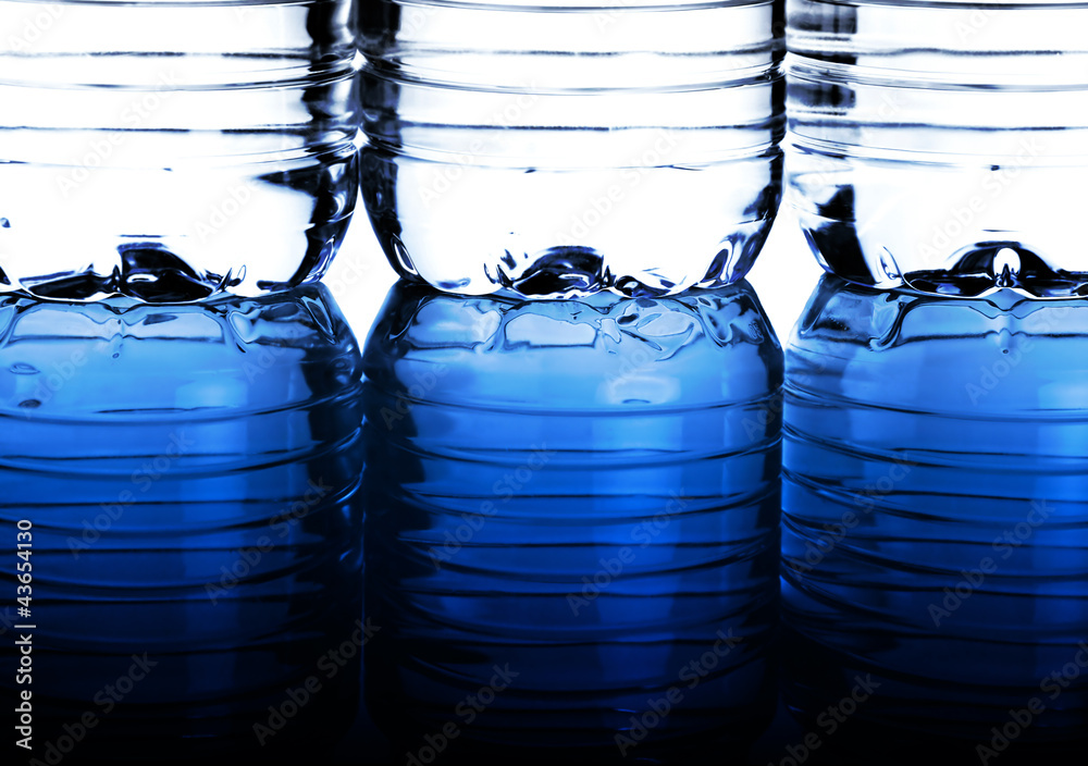 Three bottles of fresh water Stock Photo | Adobe Stock