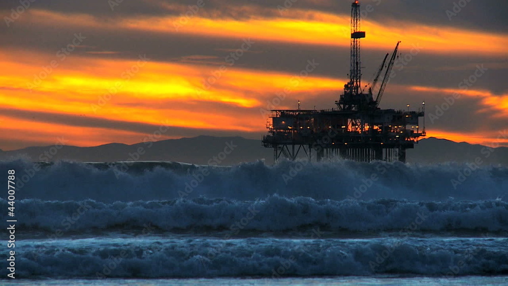 Distant Oil Rig Sunset Stock Video | Adobe Stock