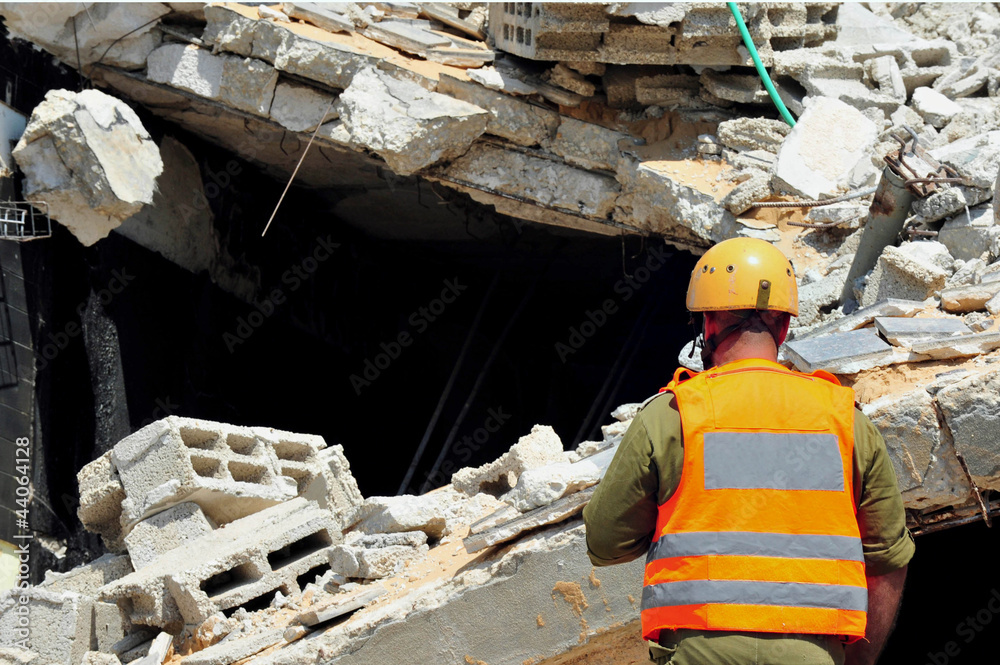Search and Rescue Through Building Rubble after a Disaster Stock Photo ...