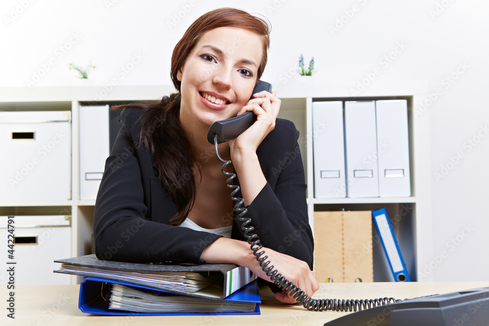 Frau telefoniert im Büro Stock Photo | Adobe Stock