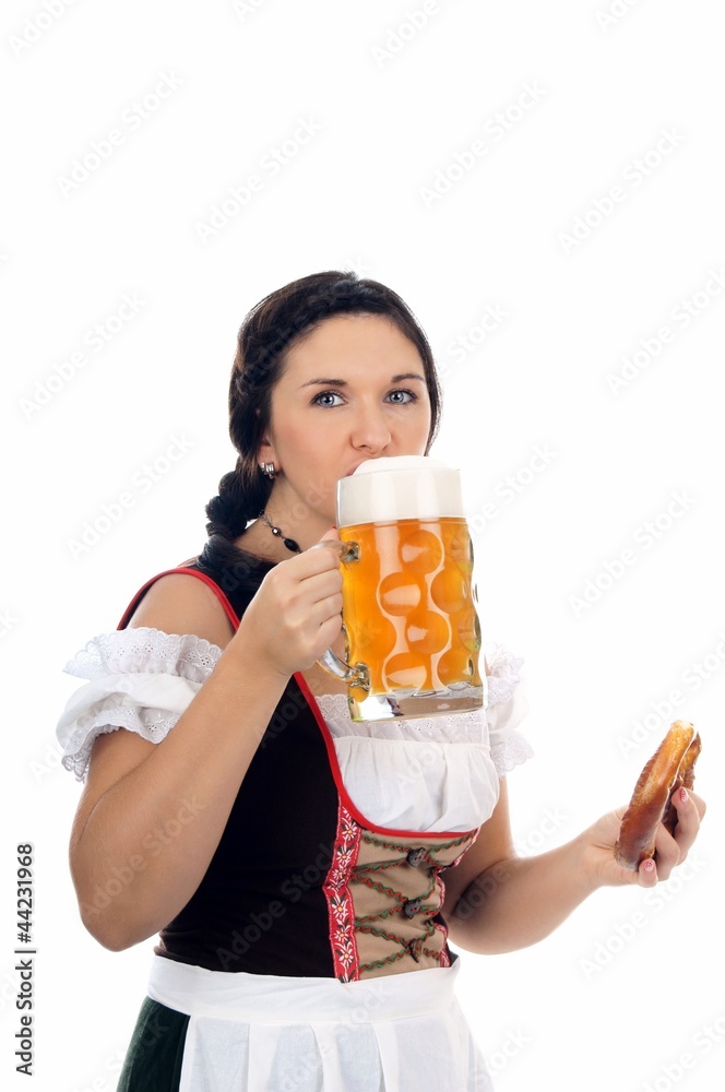 junge hübsche Frau im Dirndl mit Bier und Brezn Stock Photo | Adobe Stock