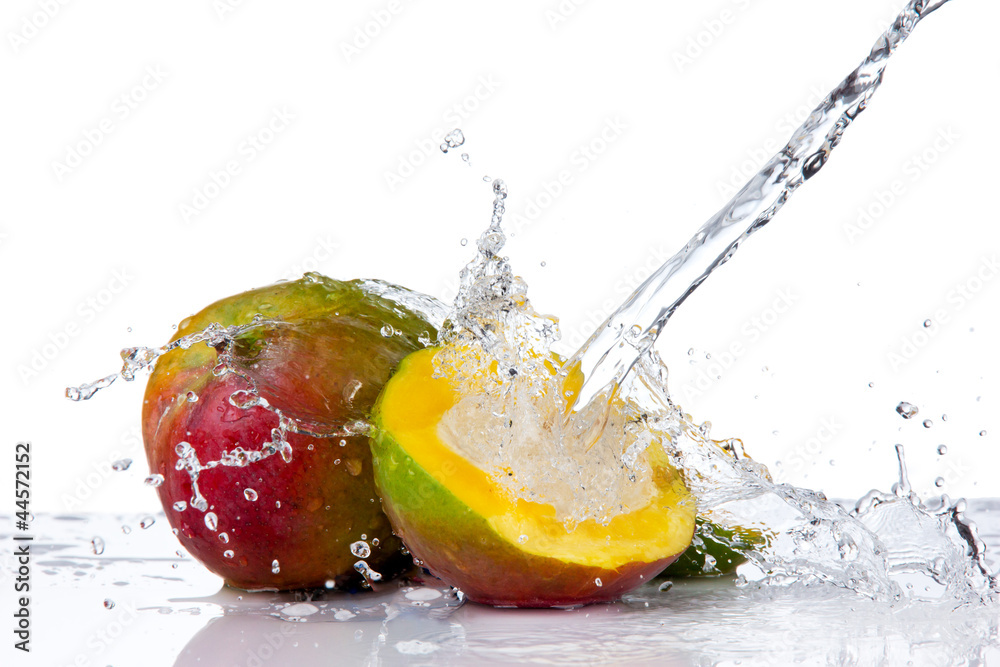 Mango in water splash, isolated on white background Stock Photo | Adobe ...