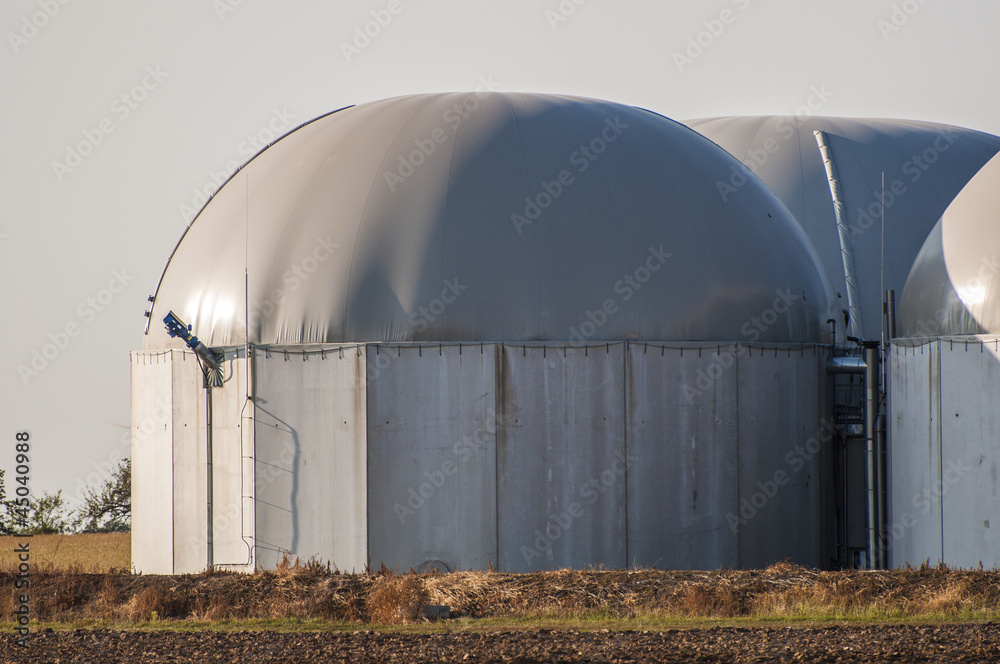 Biogas plant with biomass tank. Stock Photo | Adobe Stock