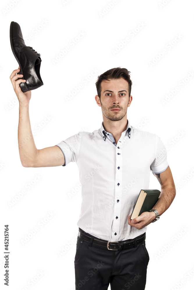 Man with one shoe and a book Stock 写真 | Adobe Stock