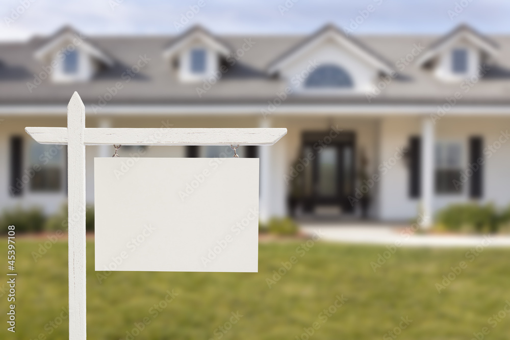 Blank Real Estate Sign in Front of New House Stock Photo | Adobe Stock
