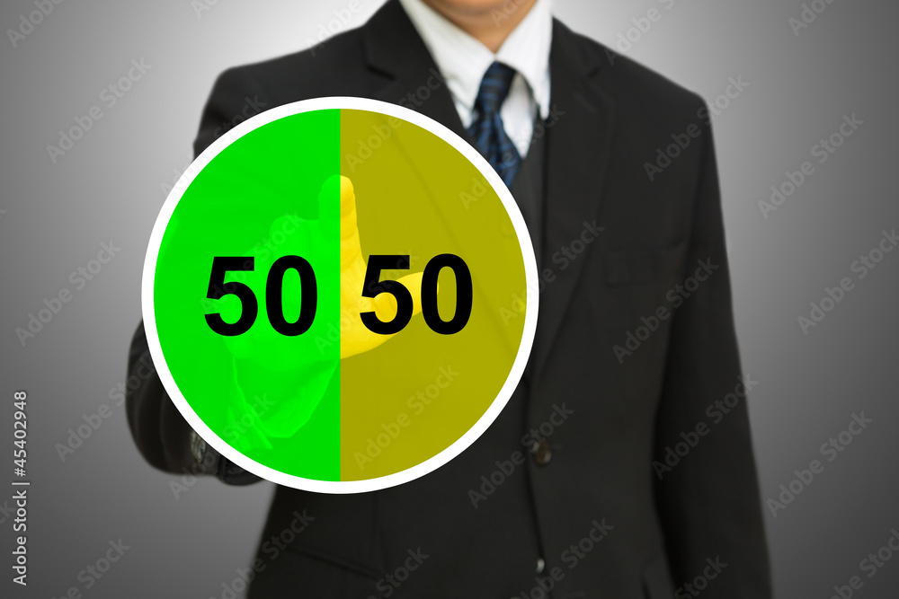 Business man touching on Pie chart with fifty-fifty percent. 50 Stock ...