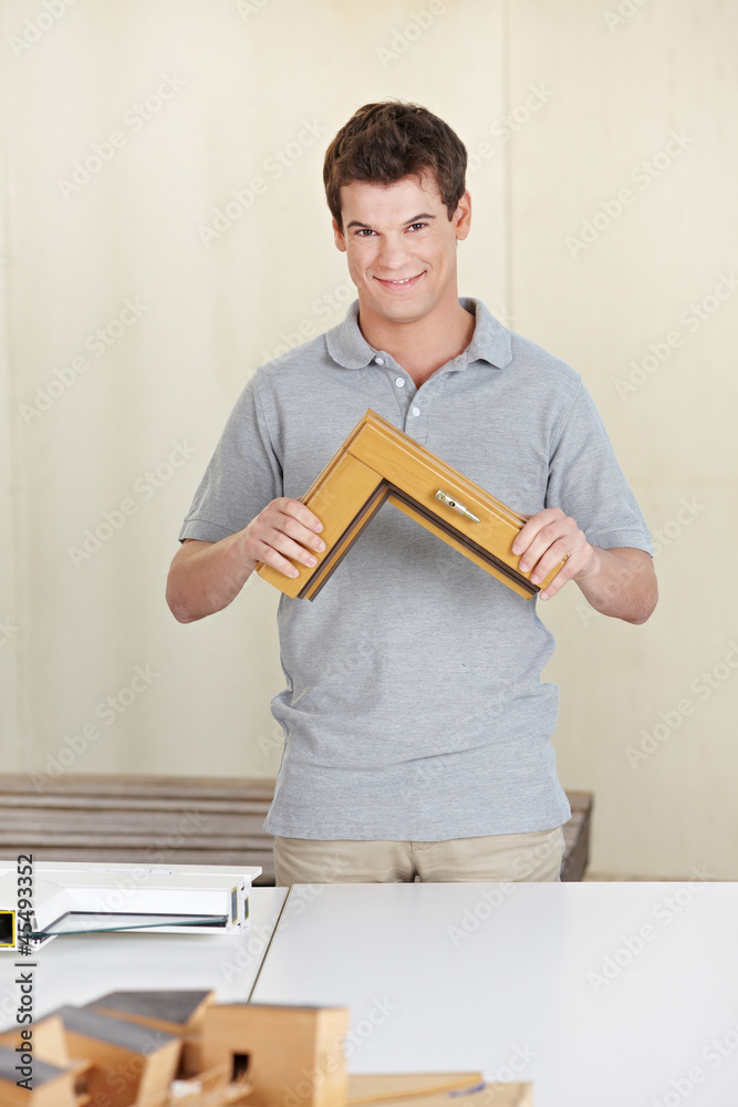 Handwerker mit Muster-Fensterrahmen Stock Photo | Adobe Stock