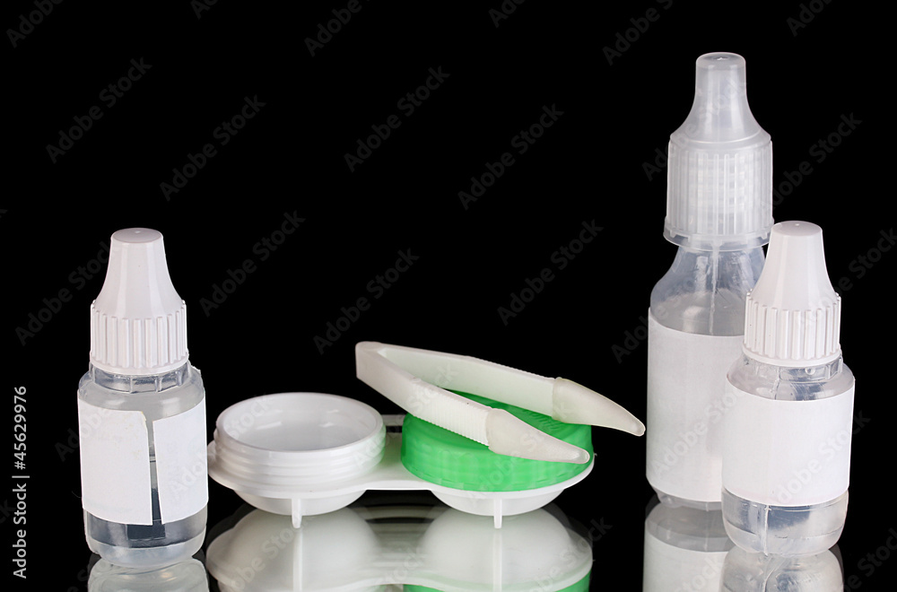 Eye drops and lenses on black background Stock Photo | Adobe Stock