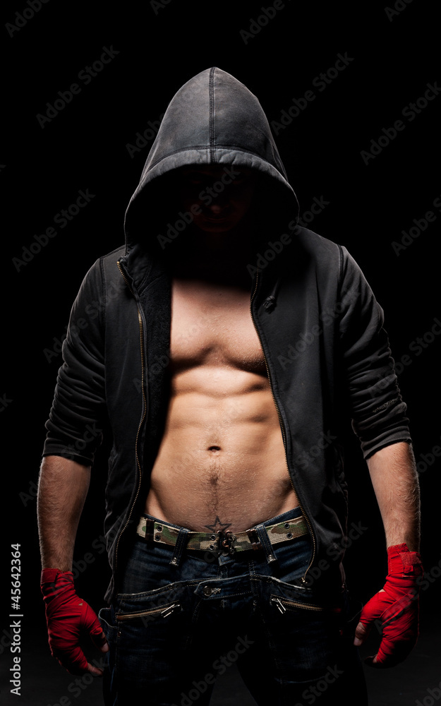 strong man with red bandage Stock Photo | Adobe Stock