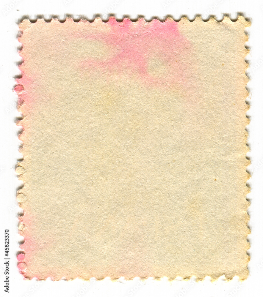 The reverse side of a postage stamp. Stock Photo | Adobe Stock
