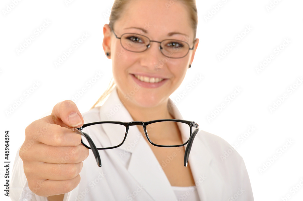 Optikerin reicht Brille Stock-Foto | Adobe Stock