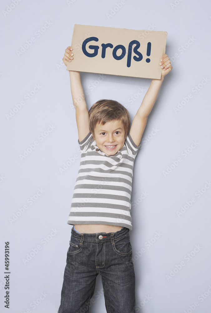 Kleines Kind macht sich ganz groß Stock Photo | Adobe Stock