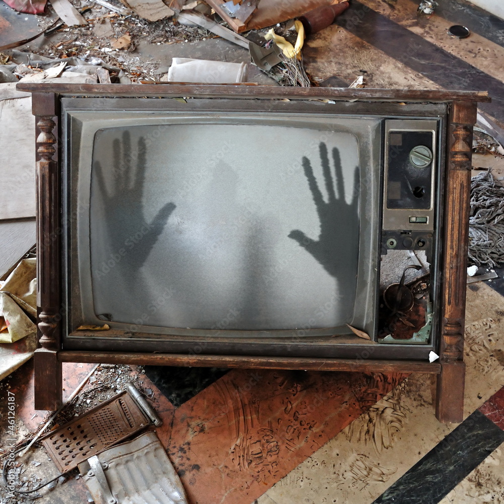 ghost appears on flickering tv set Stock Photo | Adobe Stock