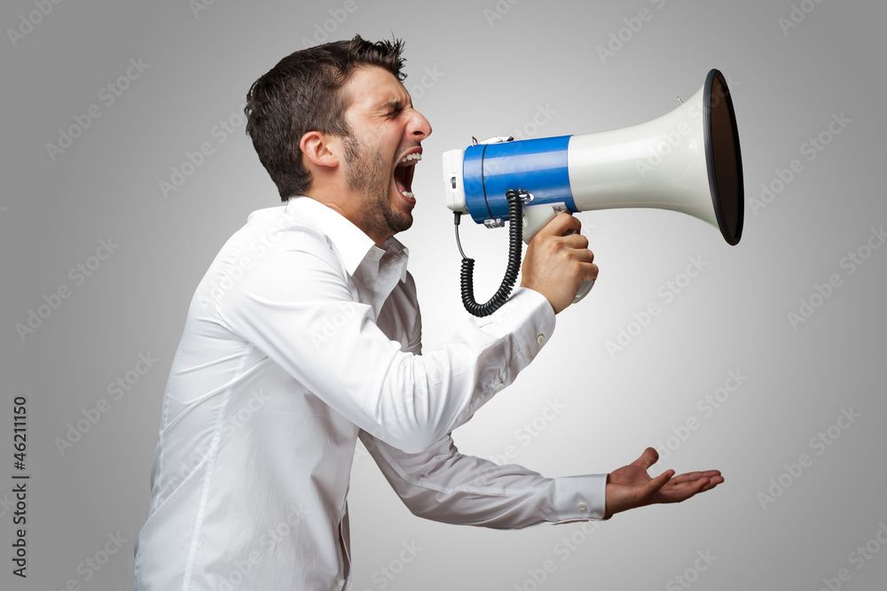 Man Yelling Through Megaphone