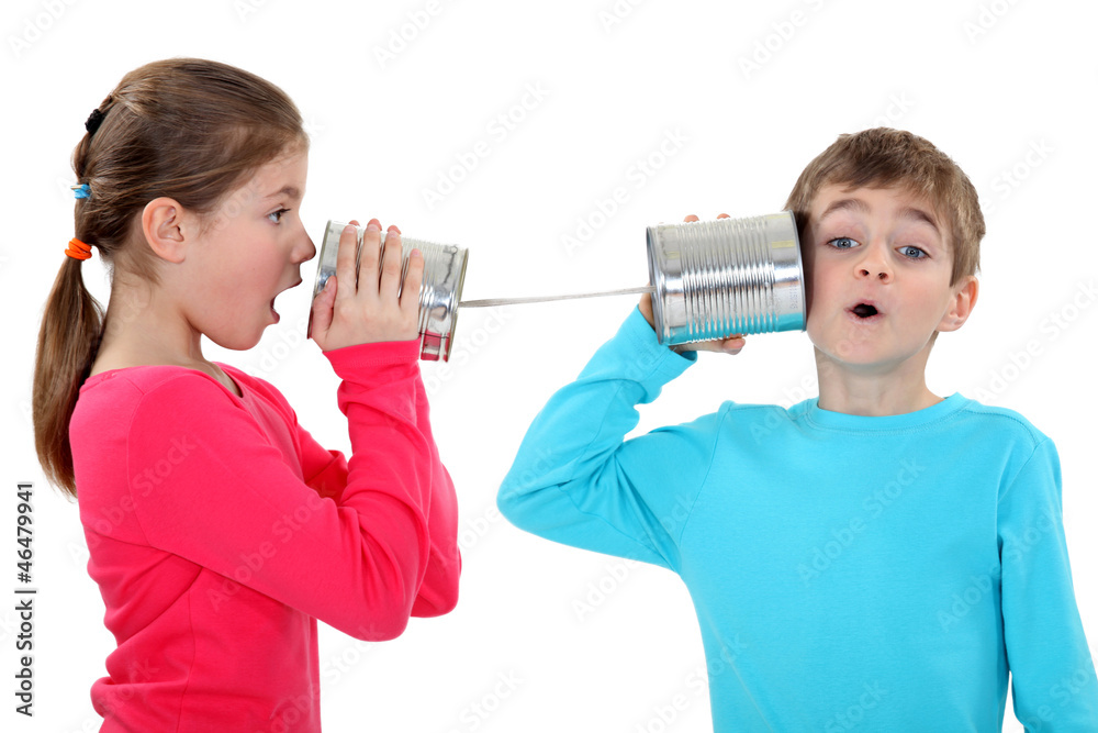 kids playing with tins Stock Photo | Adobe Stock