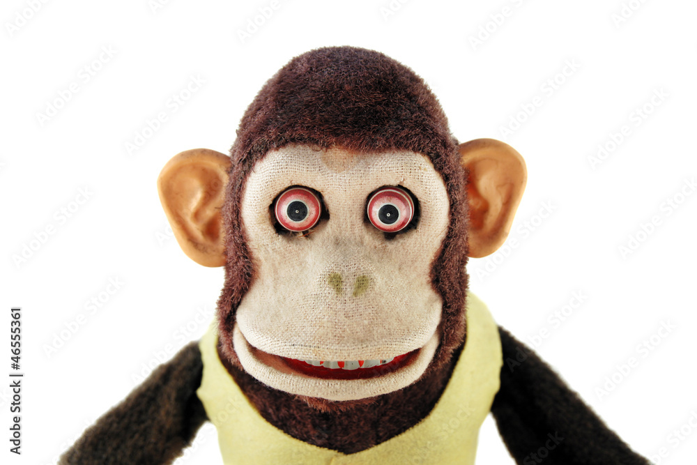 Vintage mechanical monkey toy isolated on white Stock Photo | Adobe Stock