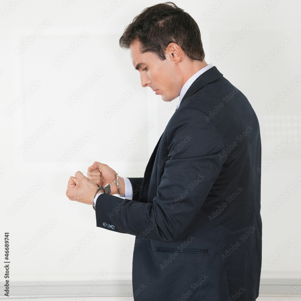 Manager in Handschellen Stock Photo | Adobe Stock