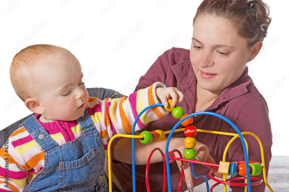 Young baby learning muscle coordination Stock Photo | Adobe Stock