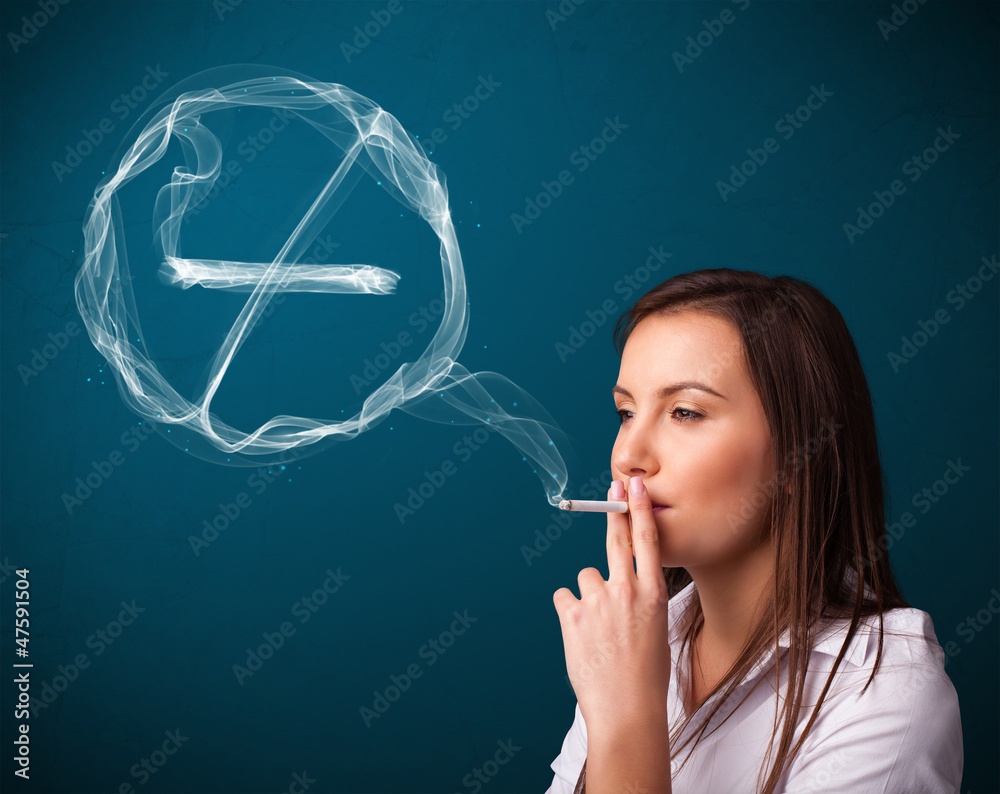 Young lady smoking unhealthy cigarette with no smoking sign Stock Photo ...