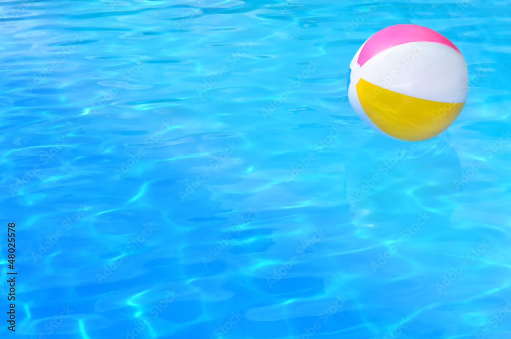 Colorful ball in swimming pool Stock Photo | Adobe Stock
