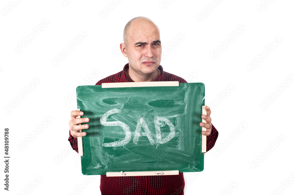 Sad man with chalkboard Stock Photo | Adobe Stock