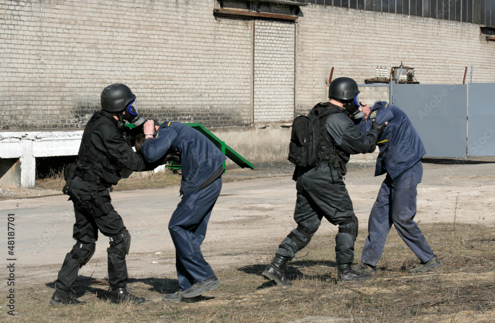 Army Soldier in full tactical gear with weapons and gas mask Stock ...