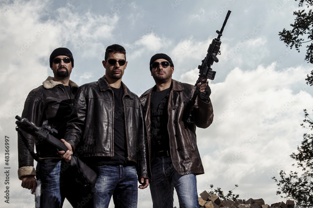 gang members with guns Stock Photo | Adobe Stock