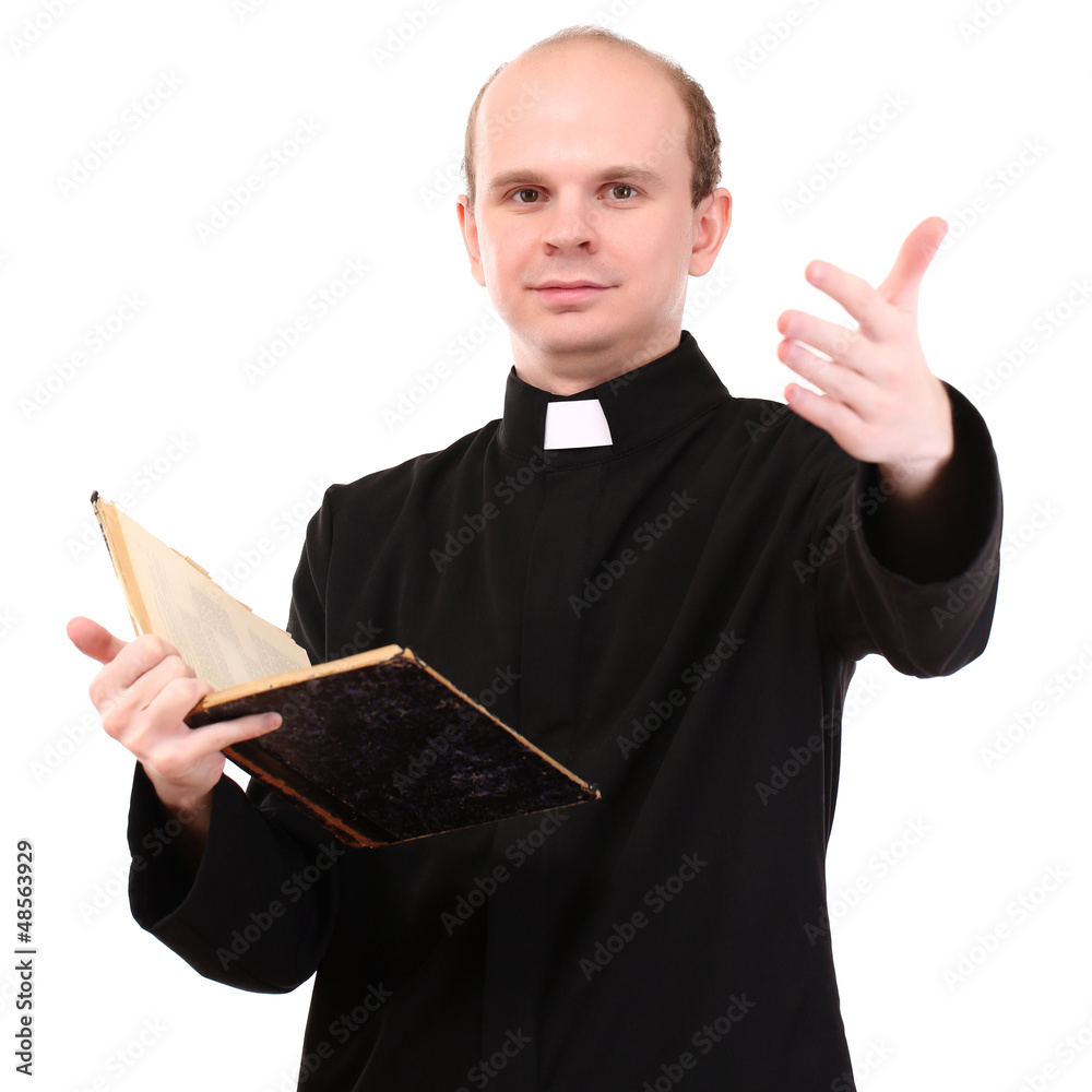 Young pastor with Bible, isolated on white Stock Photo | Adobe Stock