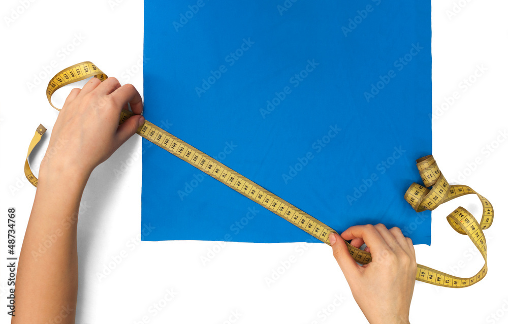 measures the size of a piece cloth Stock Photo | Adobe Stock
