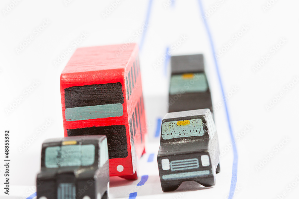Traffic: three car and one bus (right car and left bus focus) Stock ...