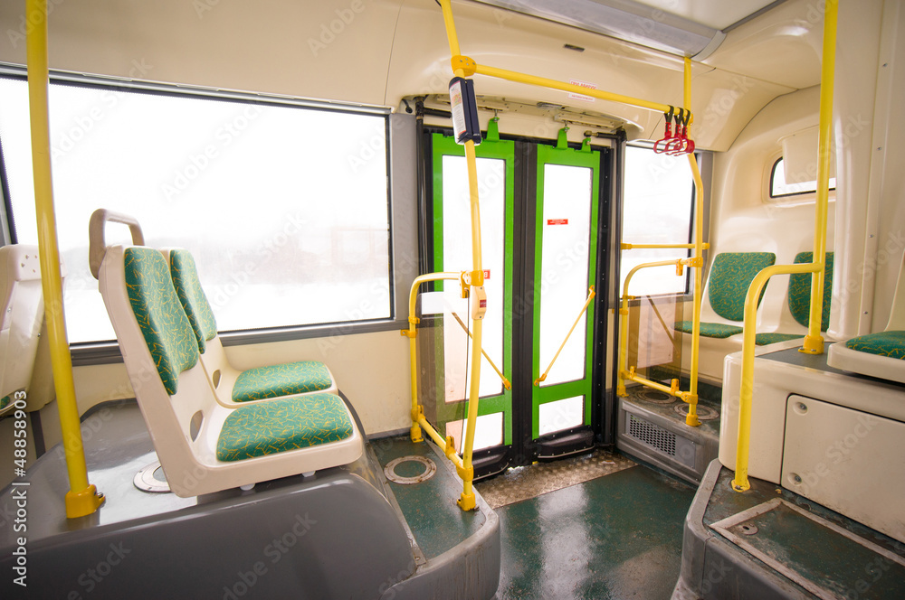 Interior of modern city bus. Seat places and door in back side o Stock ...