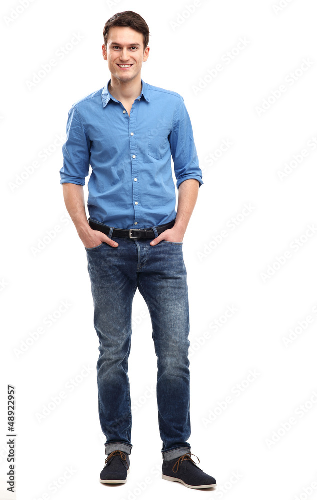 Casual young man standing Stock Photo | Adobe Stock